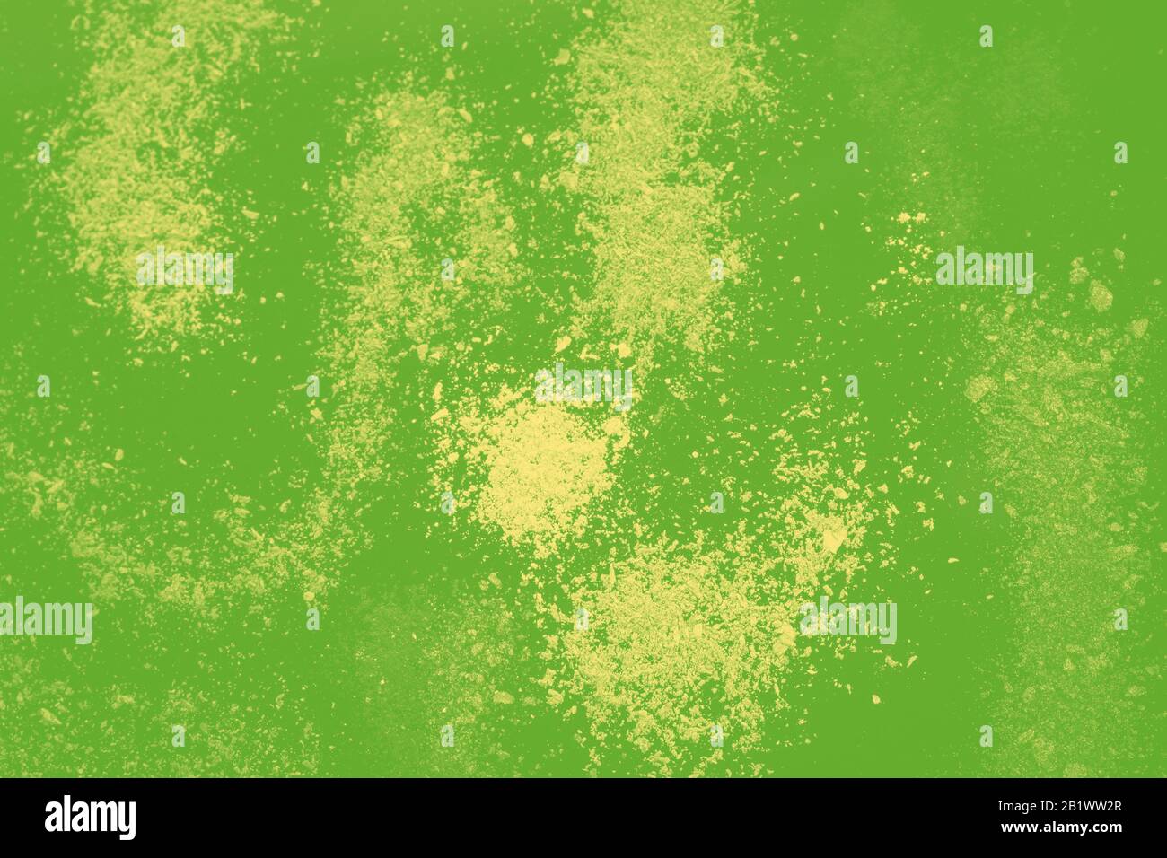 Abstract green background with pale yellow powder spots Stock Photo - Alamy