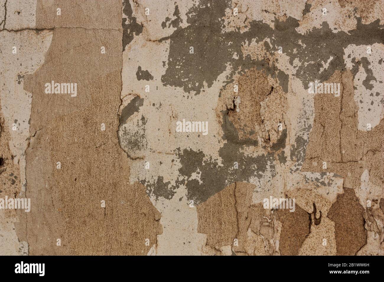 Texture of a wall to which the passage of time has caused the paint to ...