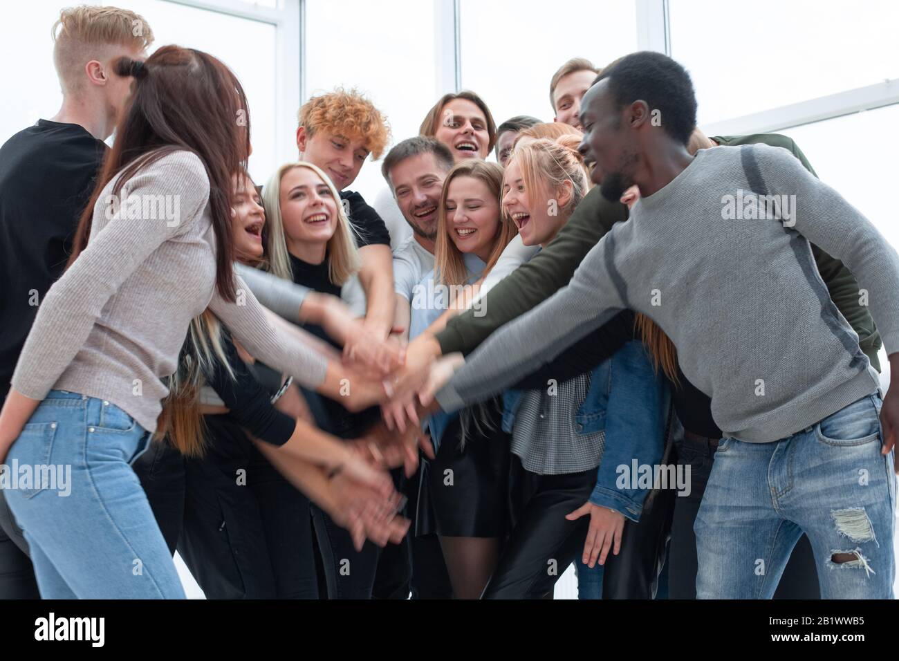 group of happy young people showing their unity Stock Photo - Alamy