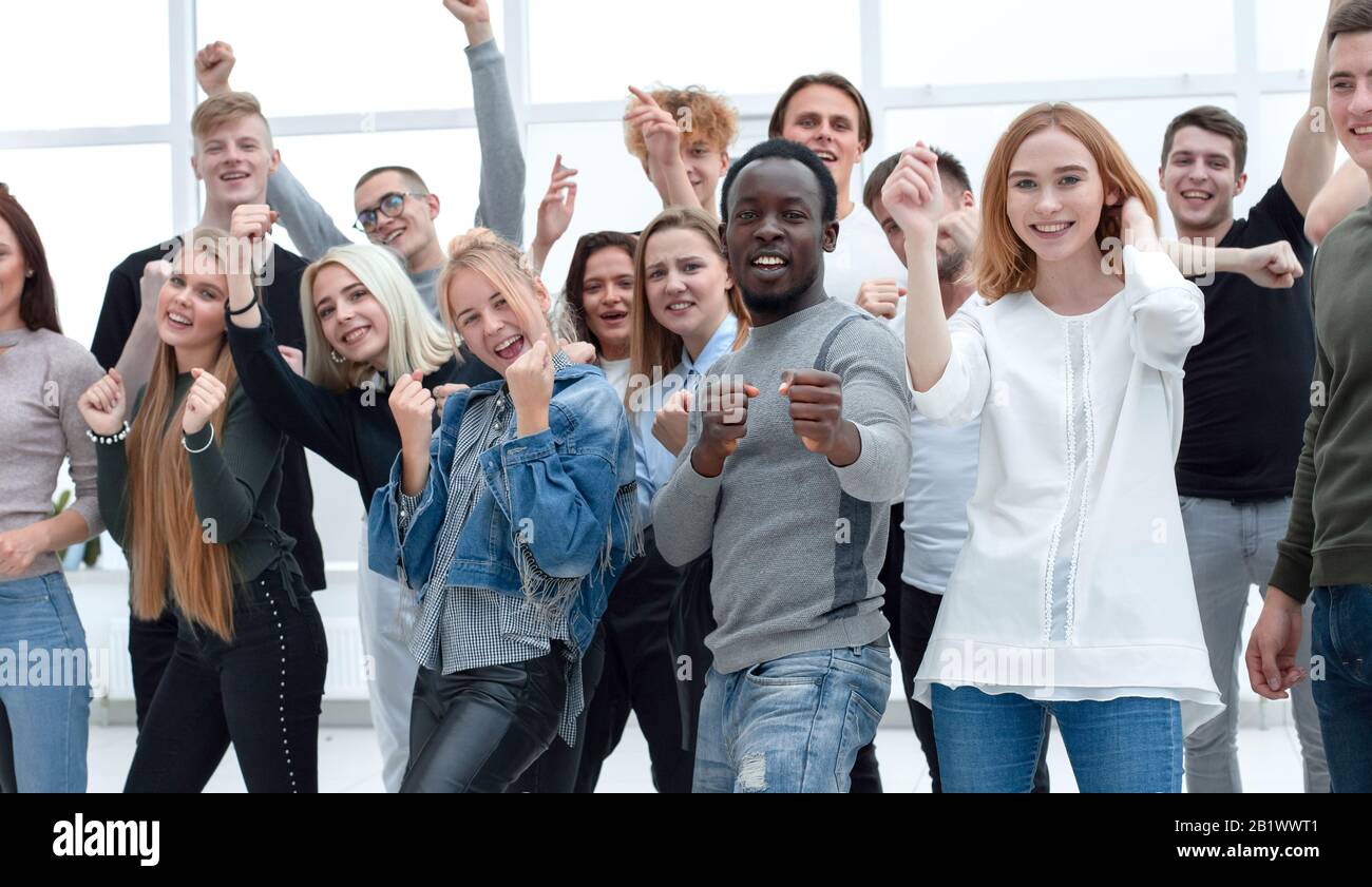 close up. a fun group of friends standing together Stock Photo - Alamy