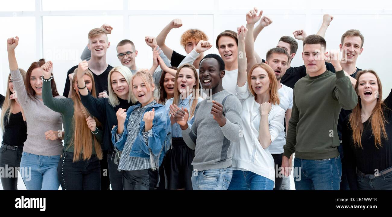 close up. a fun group of friends standing together Stock Photo - Alamy
