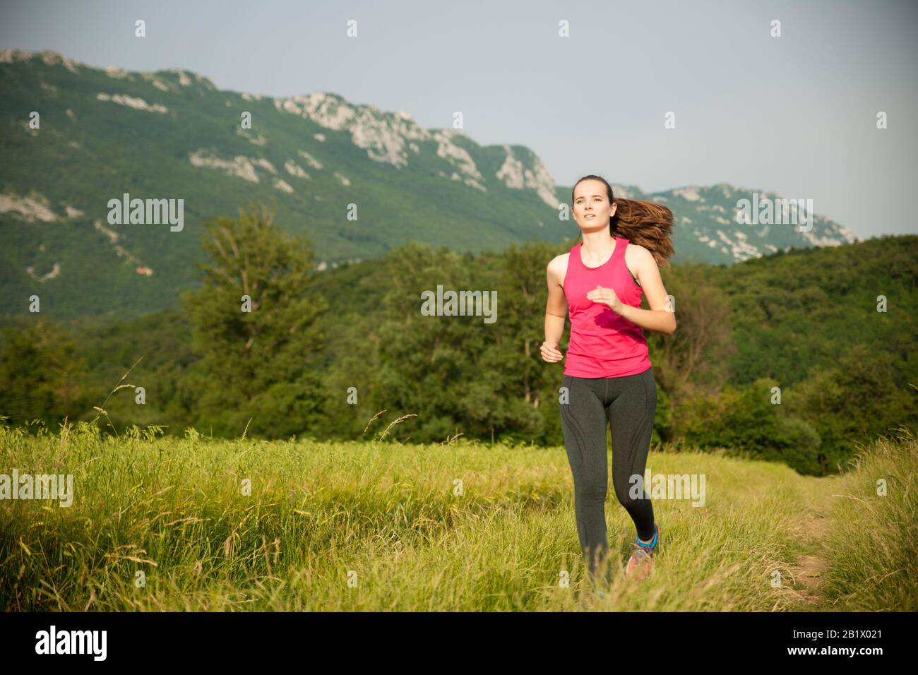 Run across grass hi-res stock photography and images - Alamy
