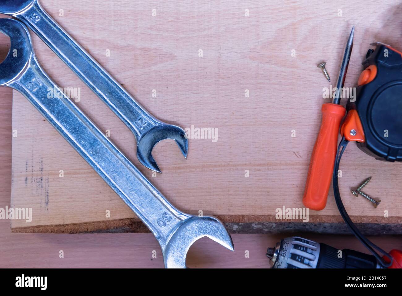set of hand working tools on wooden background The concept of tools and ...