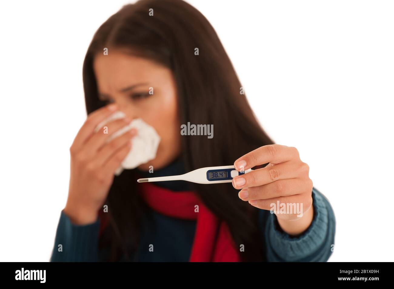 Ill woman has fever checking body temperature with thermometer isolated ...