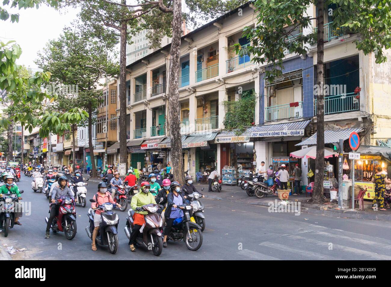 Saigon (Ho Chi Minh City) motorbikes - Dozen of motorbikes on a street ...
