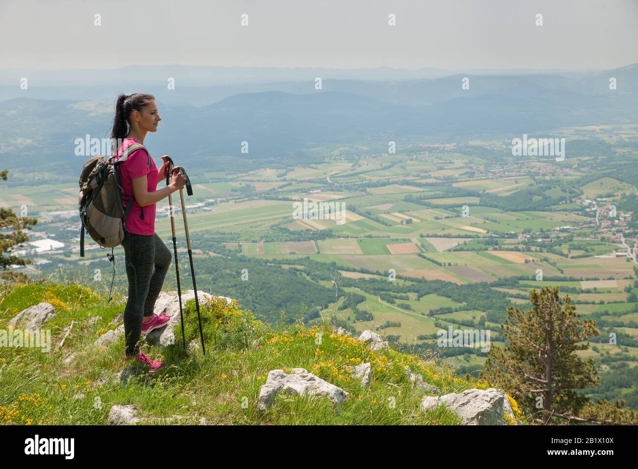 Young hiker on mountain peak hi-res stock photography and images - Alamy