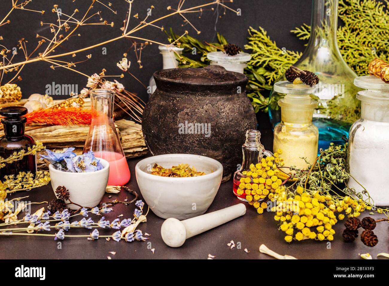 Halloween concept. Alchemy laboratory of the witch. Flasks, retorts ...