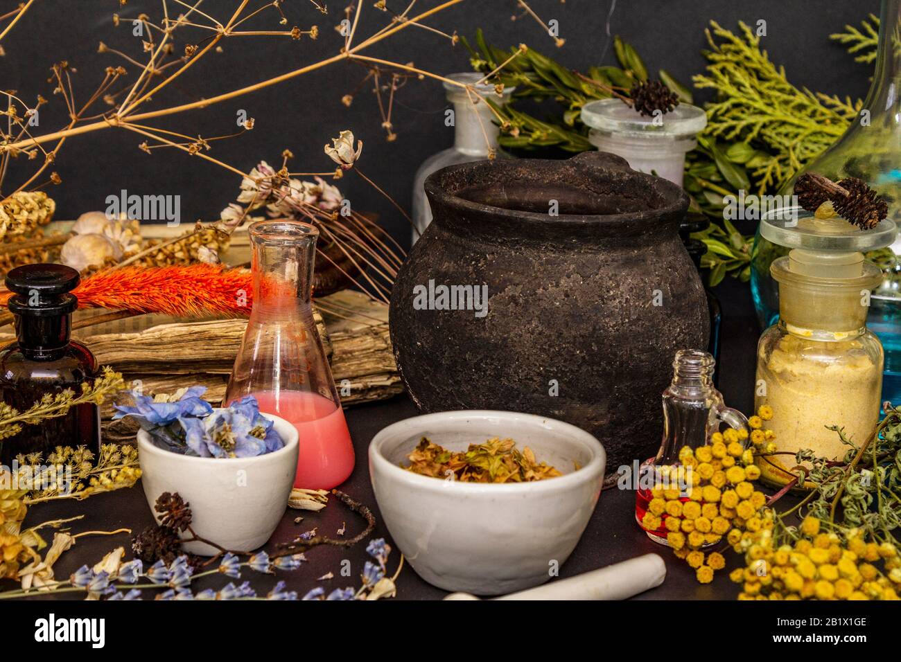 Halloween concept. Alchemy laboratory of the witch. Flasks, retorts ...