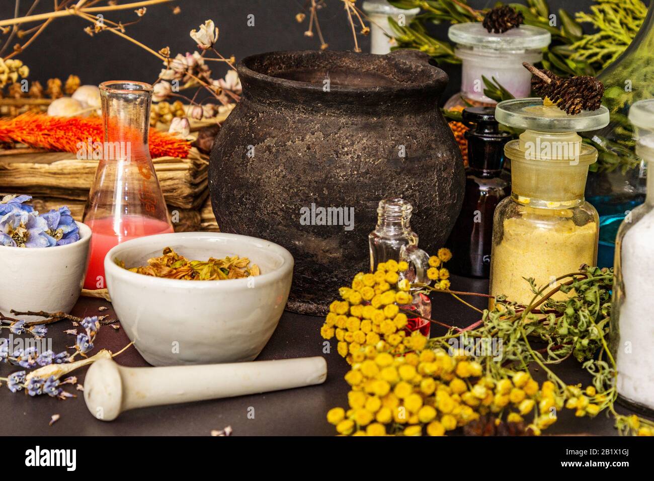 Halloween concept. Alchemy laboratory of the witch. Flasks, retorts ...