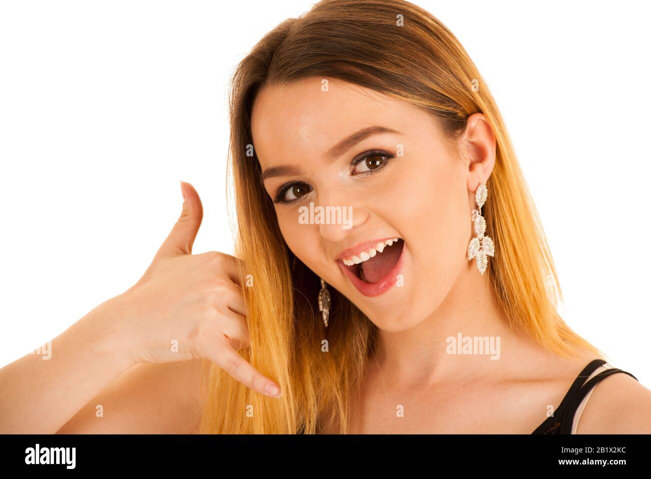 Cute young woman gesturing call me isolated over white background Stock ...