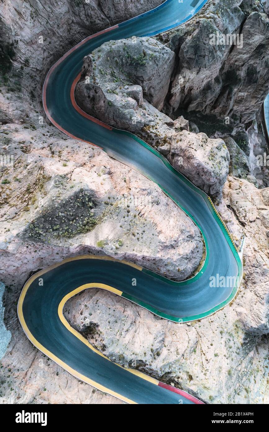 aerial view of a steep mountain road Stock Photo - Alamy
