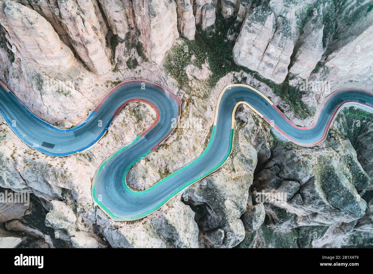 aerial view of a steep mountain road Stock Photo - Alamy