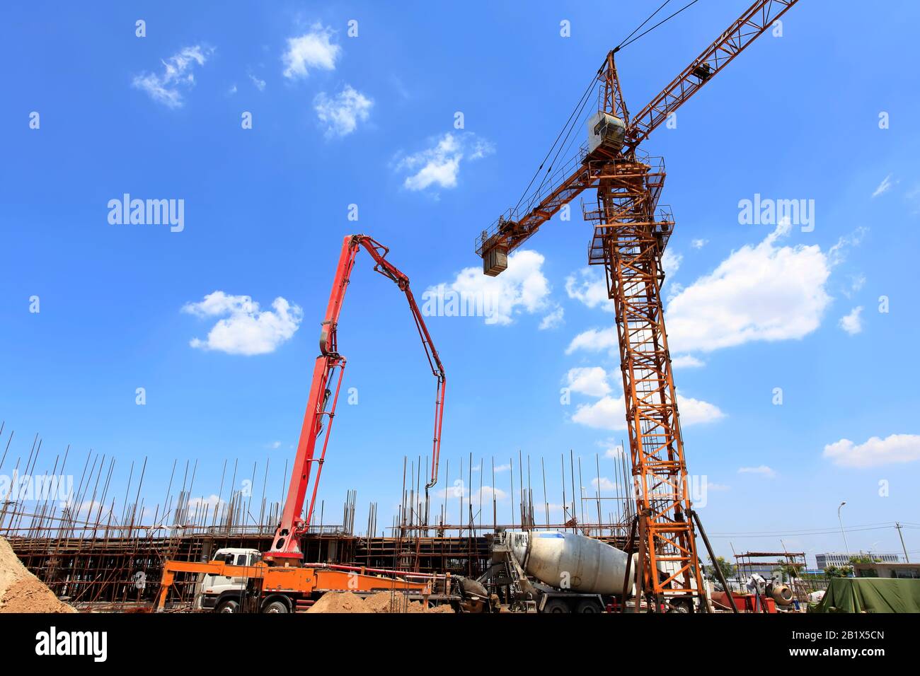 Construction site under the blue sky white clouds Stock Photo - Alamy