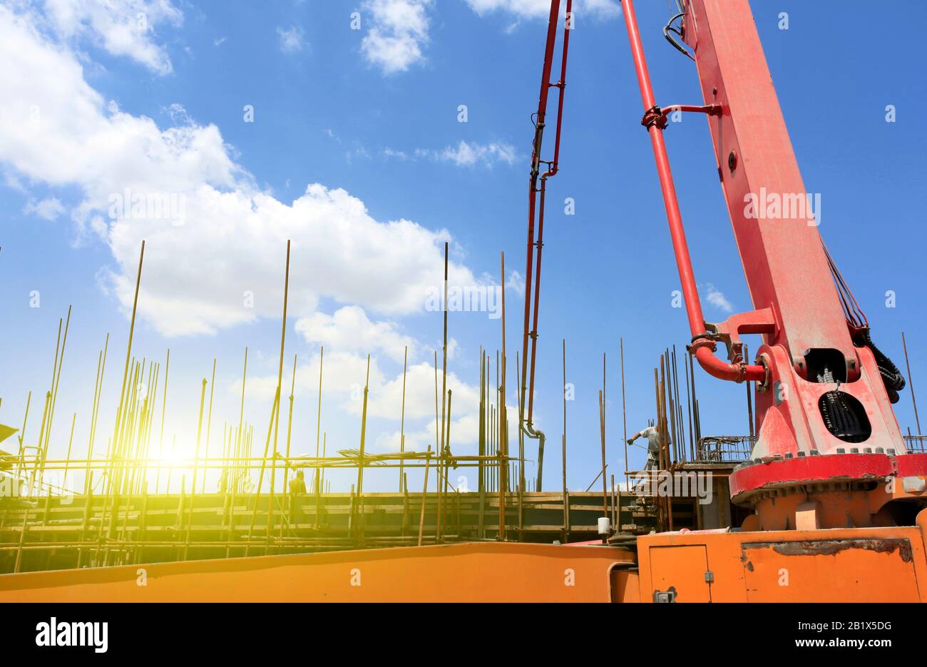 Construction site under the blue sky white clouds Stock Photo - Alamy