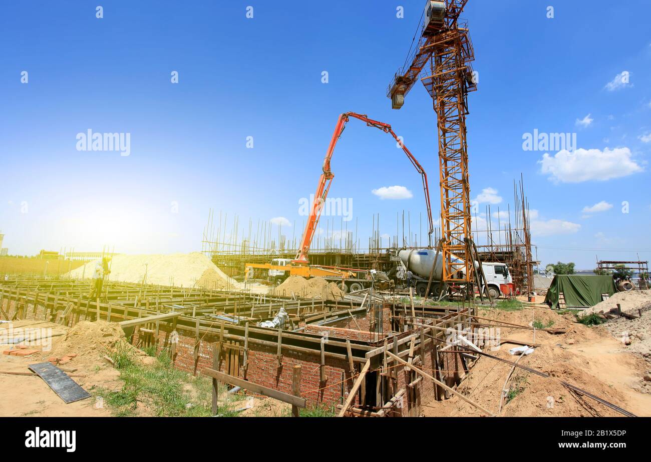 Construction site under the blue sky white clouds Stock Photo - Alamy