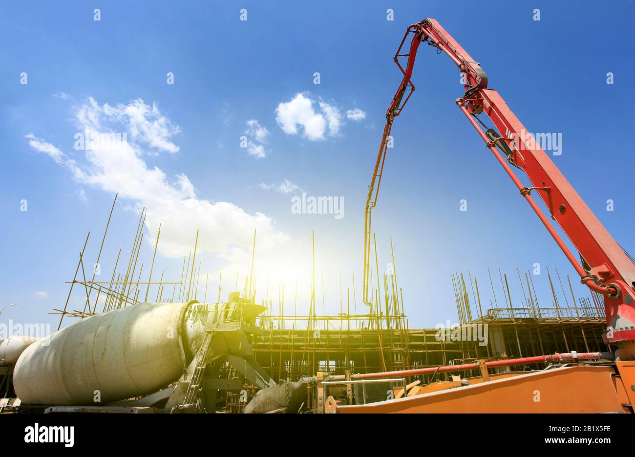 Construction site under the blue sky white clouds Stock Photo - Alamy