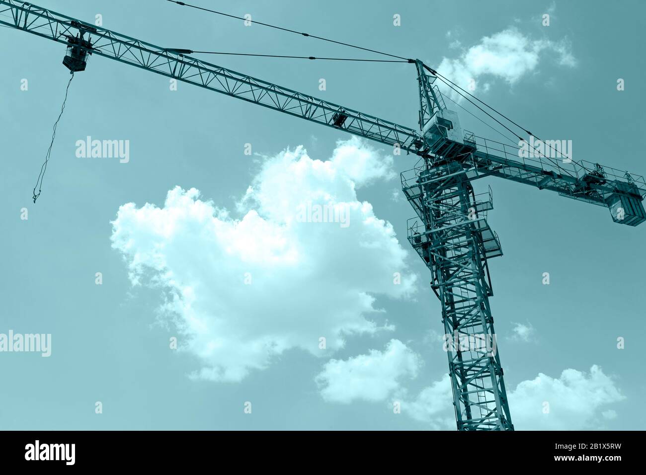Crane in work at the construction site Stock Photo - Alamy