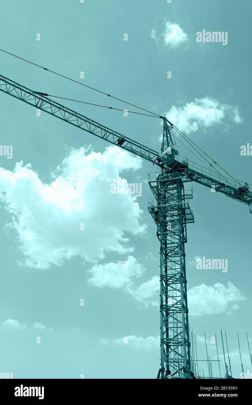 Crane in work at the construction site Stock Photo - Alamy
