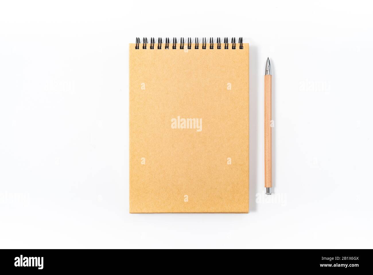 Brown spiral notebook isolated on white background.top view Stock Photo ...