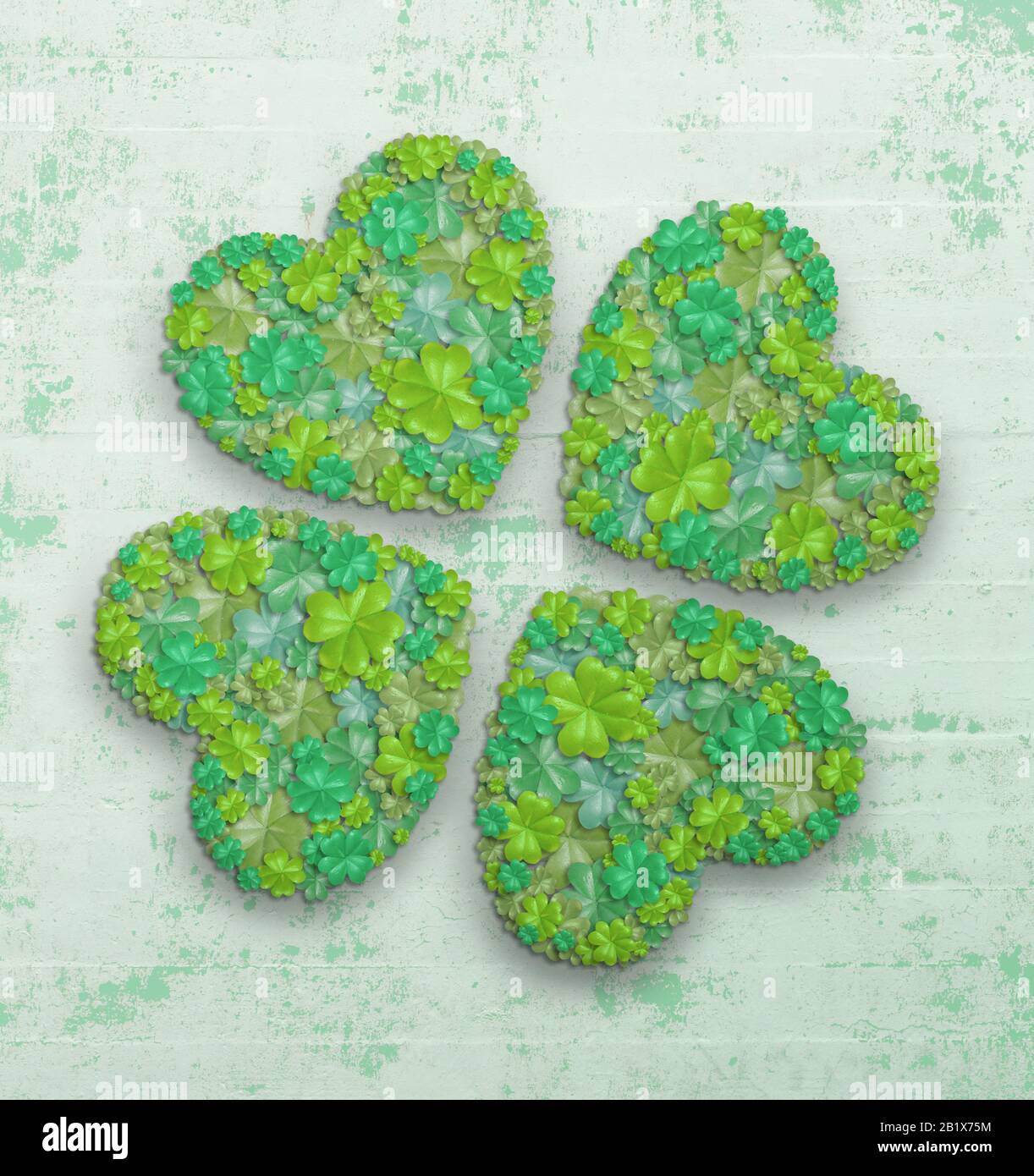 Multiple clover flowers in shape of shamrock on worn, faded wood ...
