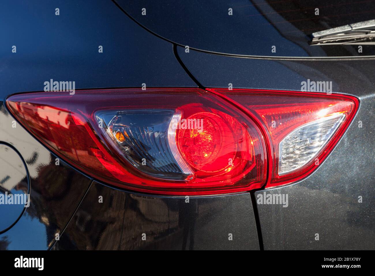 Rear lights of a sport car , back lights of a sport car Stock Photo - Alamy