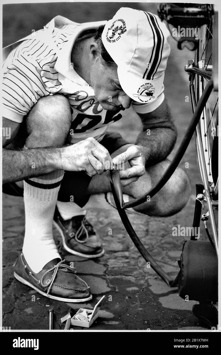 Bike puncture repair Black and White Stock Photos & Images - Alamy