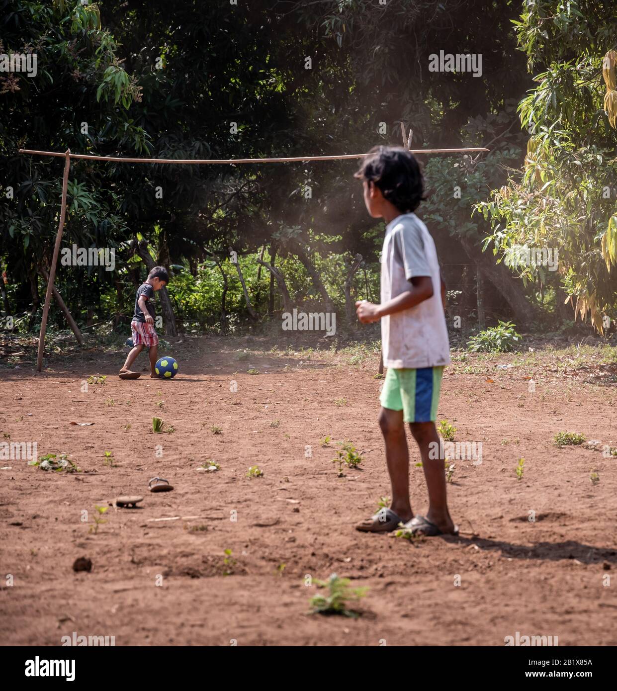Hispanic children playing soccer hi-res stock photography and images ...