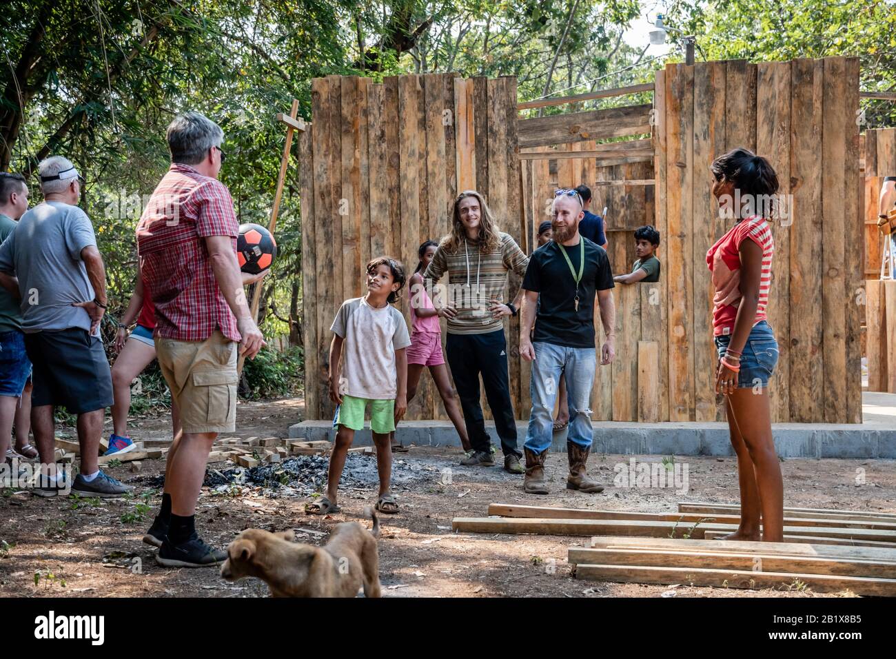 mission team talking and playing with hispanic children in Guatemala ...
