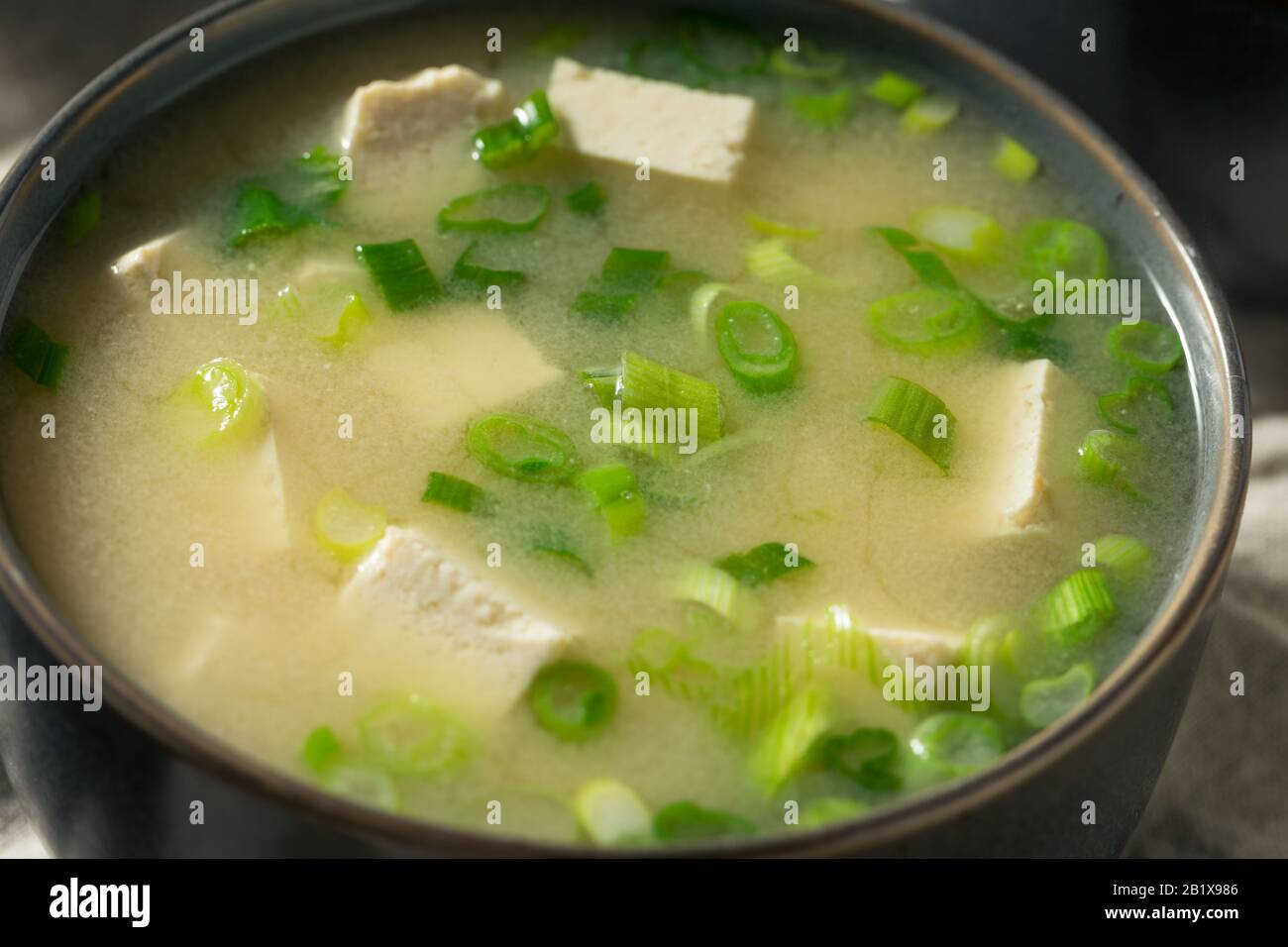Healthy Japanese Tofu Miso Soup with Green Onions Stock Photo - Alamy