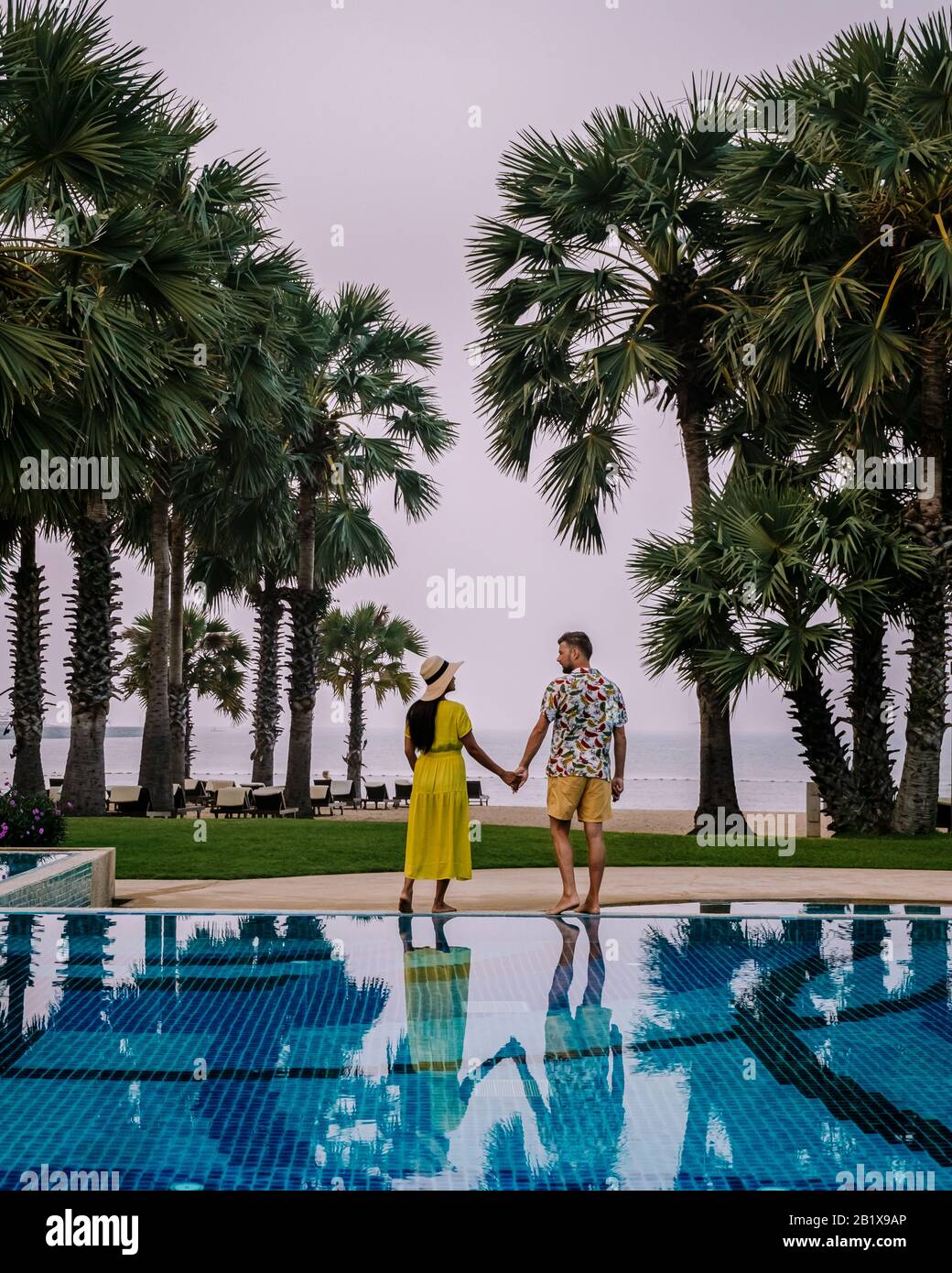 Honeymoon Couple In A Swimming Pool High Resolution Stock Photography ...