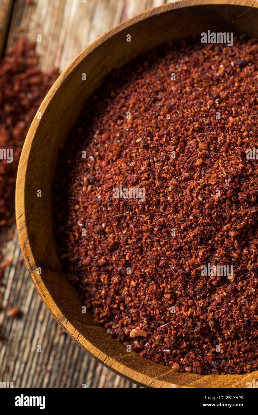 Raw Red Organic Dried Sumac in a Bowl Stock Photo - Alamy