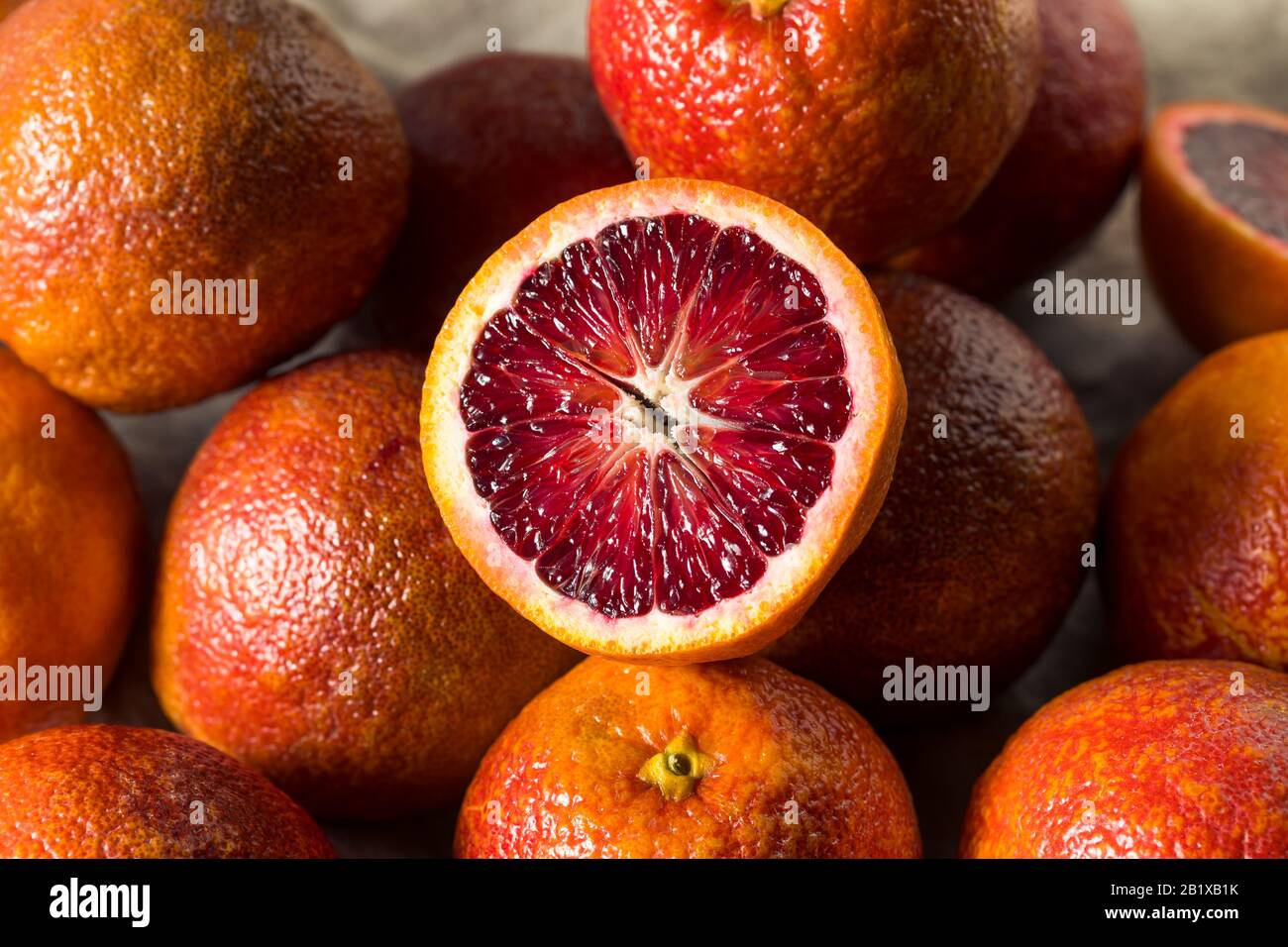 Raw Organic Red Blood Oranges in a Bunch Stock Photo - Alamy