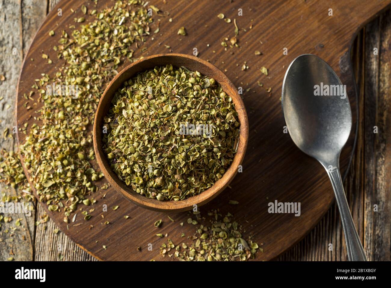 Raw Dried Green Greek Oregano Spice in a Bowl Stock Photo - Alamy