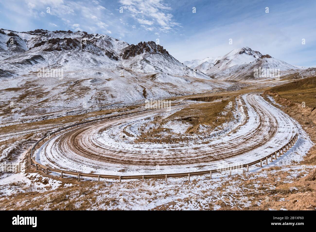 the gravel road on the snow mountain Stock Photo - Alamy