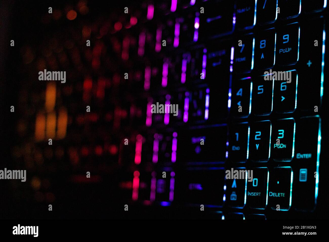 Colorful modern keyboard with rainbow backlight on black background ...