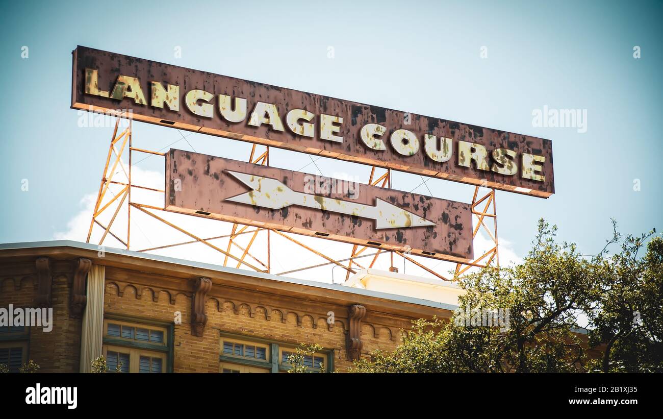 Street Sign the Direction Way to LANGUAGE COURSE Stock Photo - Alamy