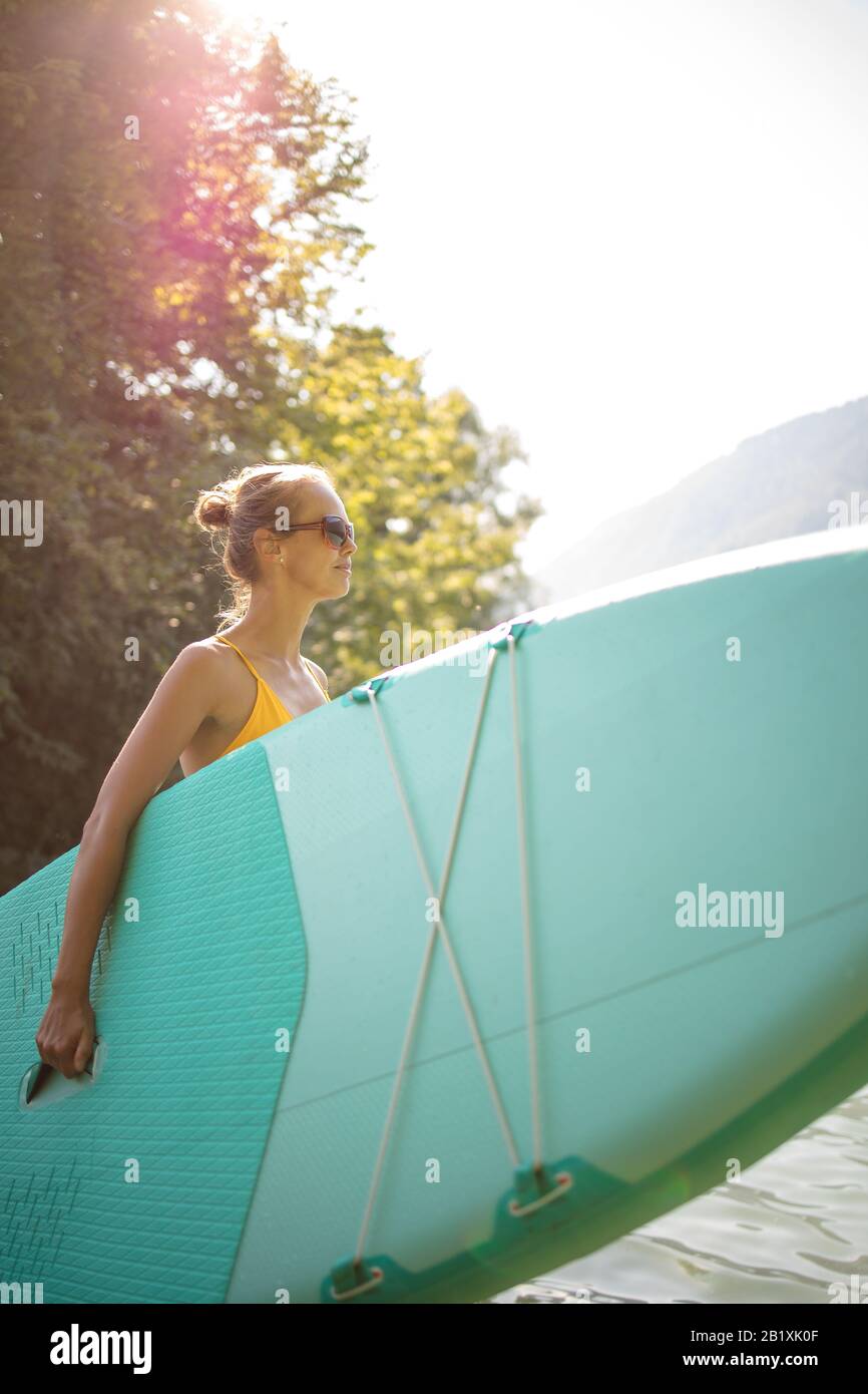Surfer Girl Paddling High Resolution Stock Photography and Images - Alamy