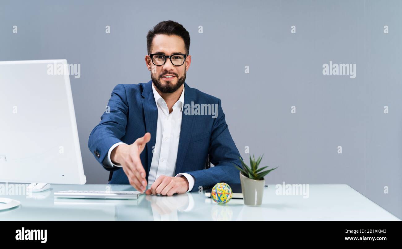 Lawyer Offering Handshake At Desk In Courtroom Stock Photo - Alamy
