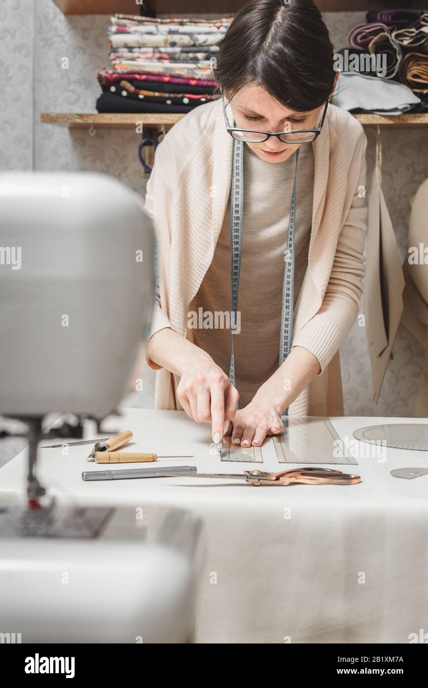 Fashion designer working sewing patterns hi-res stock photography and ...