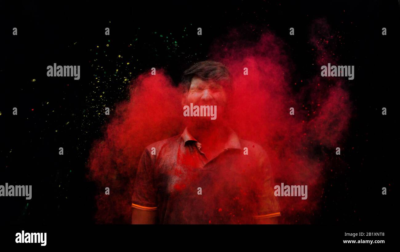 Young man celebrating holi with colors. holi is a festival of India. It ...