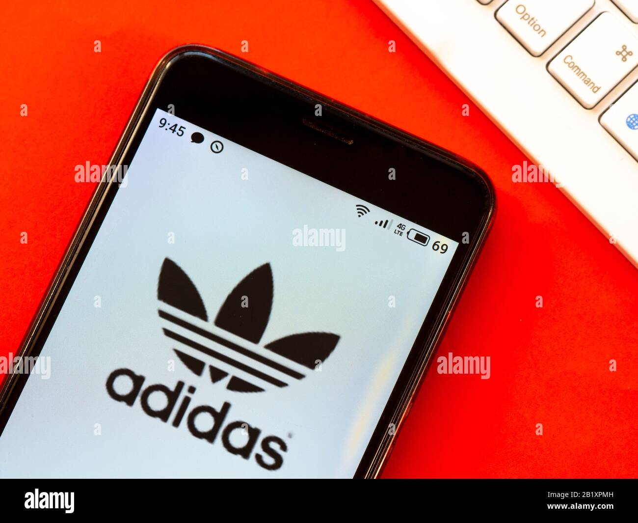 In this photo illustration the Adidas logo is seen displayed on a ...