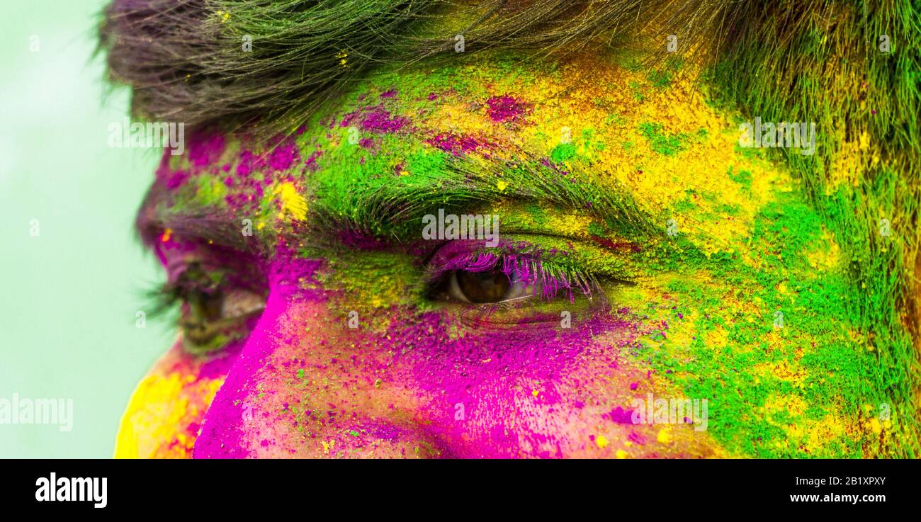 Eye with holi colors. holi is a festival of India. It is festival of ...