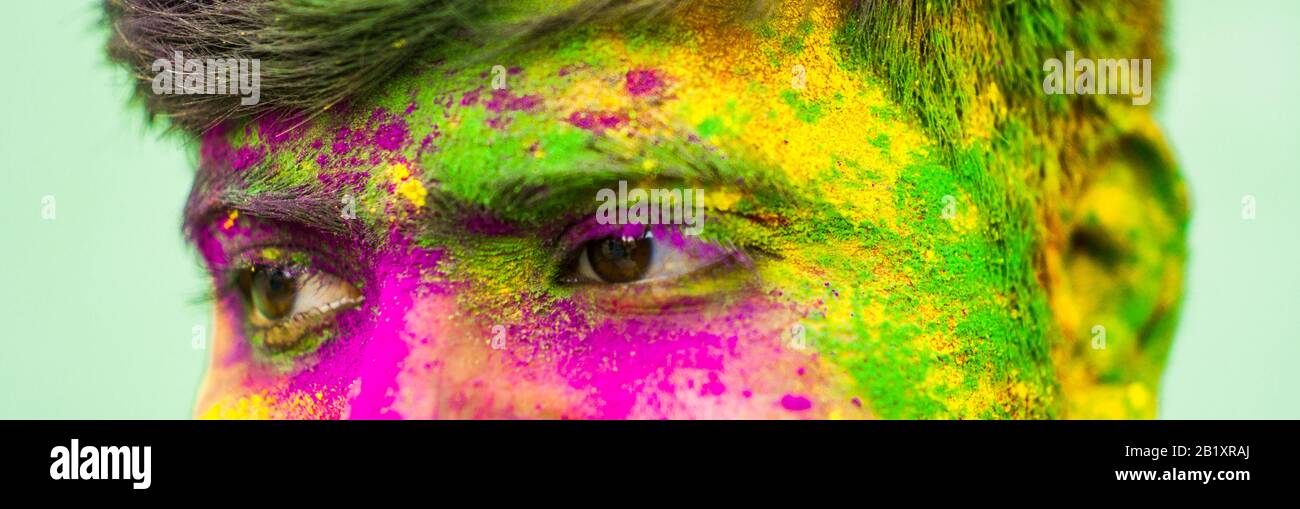 Eye with holi colors. holi is a festival of India. It is festival of ...