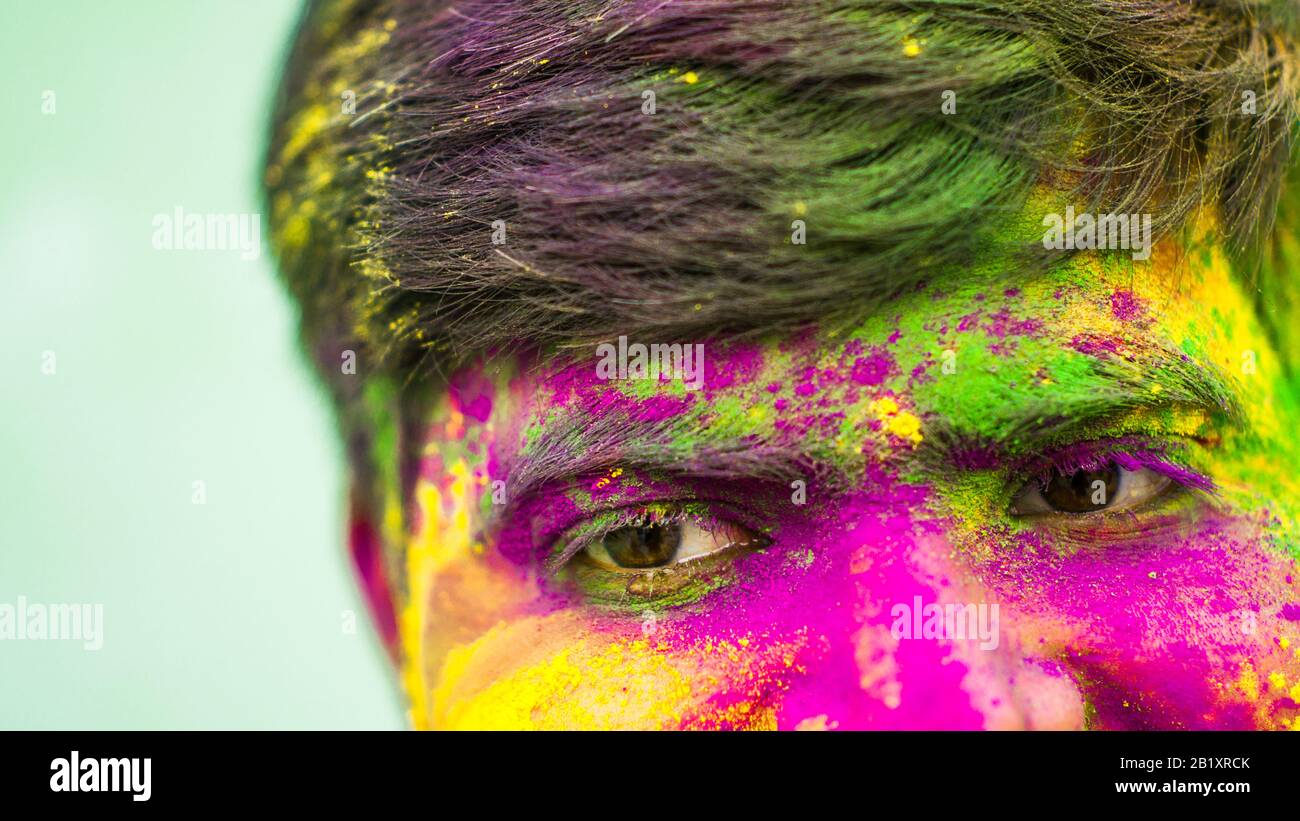 Eye with holi colors. holi is a festival of India. It is festival of ...