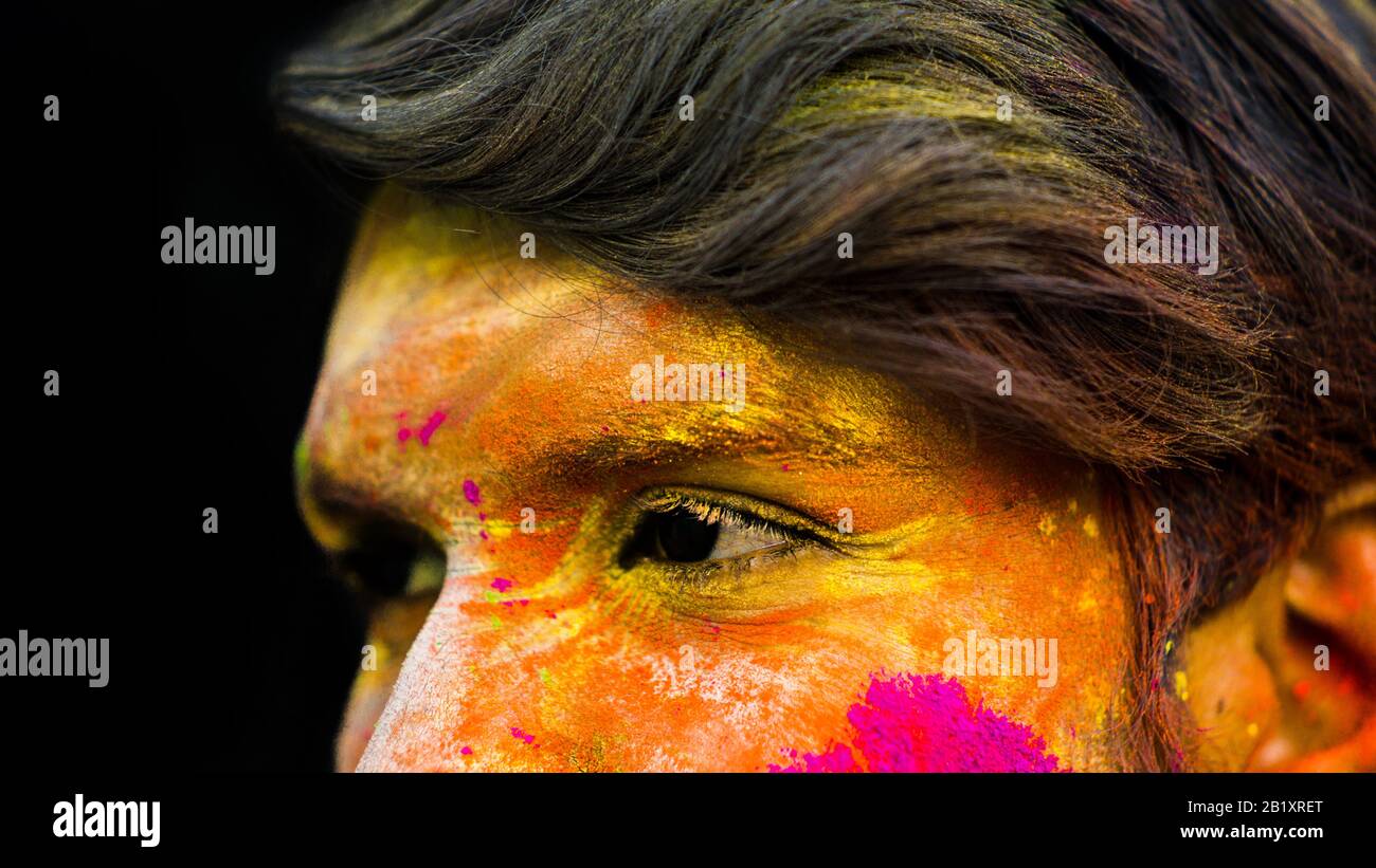 Eye with holi colors. holi is a festival of India. It is festival of ...