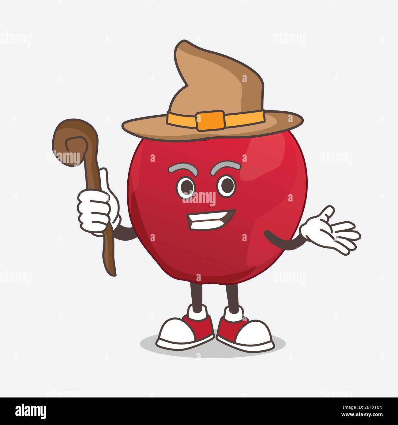 A picture of apple cartoon mascot character as a witch on the stage ...