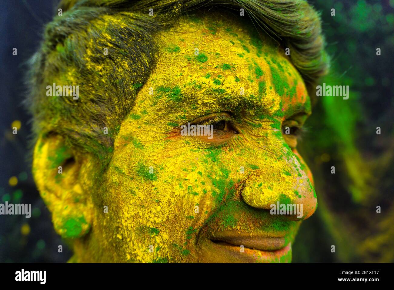 Young man celebrating holi with colors. holi is a festival of India. It ...