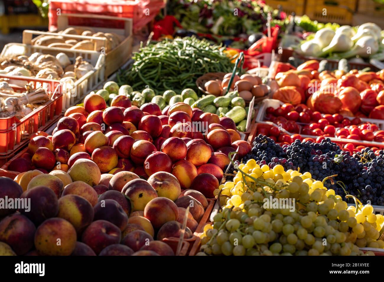 Fresh fruits and vegetables at a farmers market in Italy Stock Photo ...