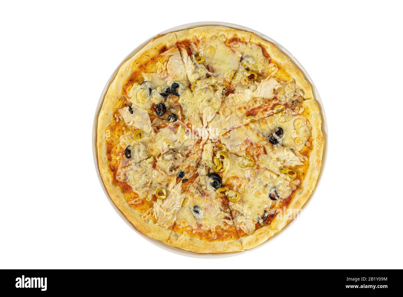 Pizza whole round, cut into pieces, on a white isolated background ...
