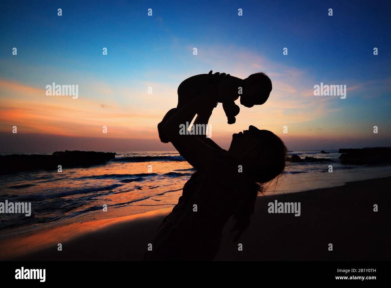 Mother catch baby hi-res stock photography and images - Alamy